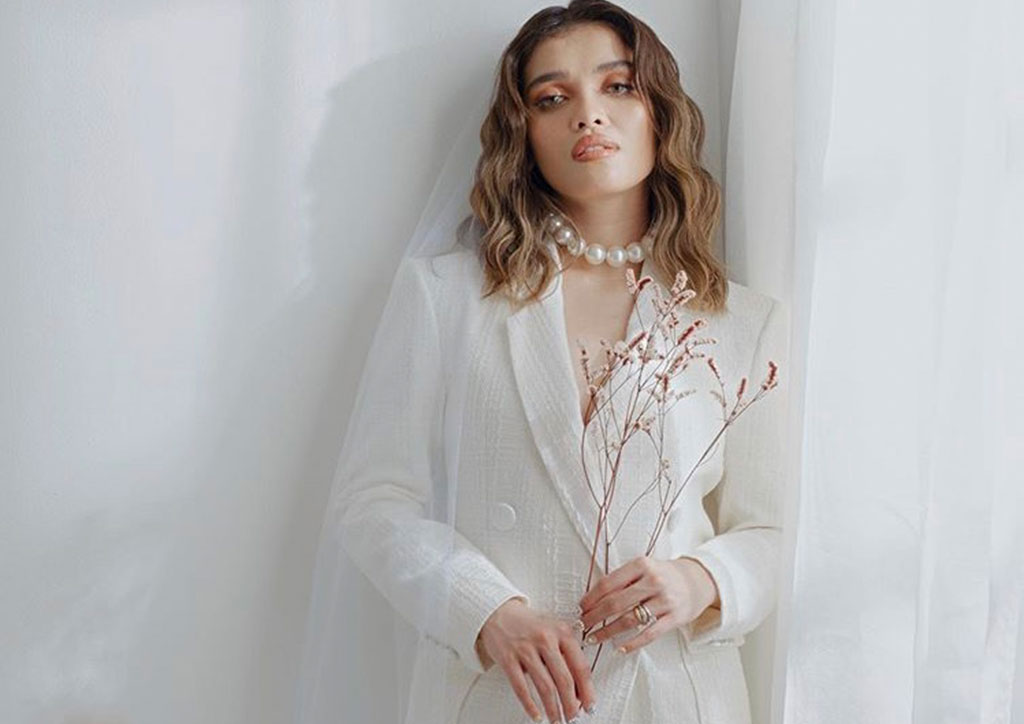 KZ Tandingan Weds in a White Suit and Pearls